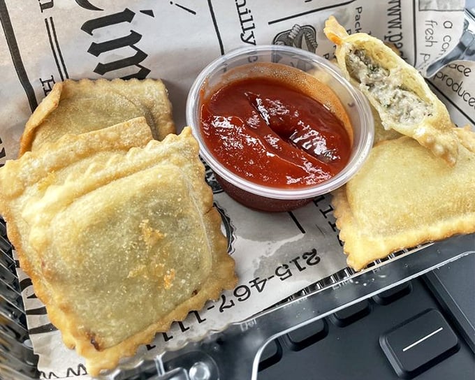 These aren't your nonna's ravioli—they're her rebellious grandchildren who went to culinary school. Crispy, saucy perfection in bite-sized form.