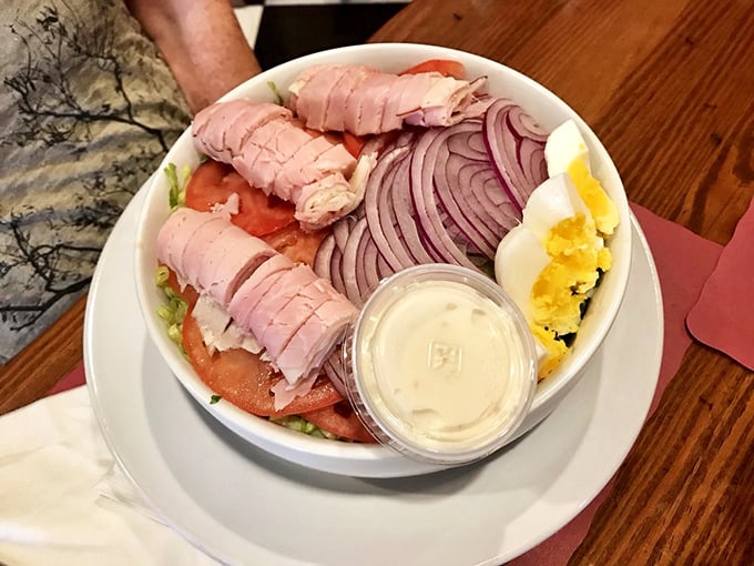 A chef's salad that doesn't skimp on the good stuff—where thinly-sliced ham and hard-boiled eggs aren't garnishes but main characters.