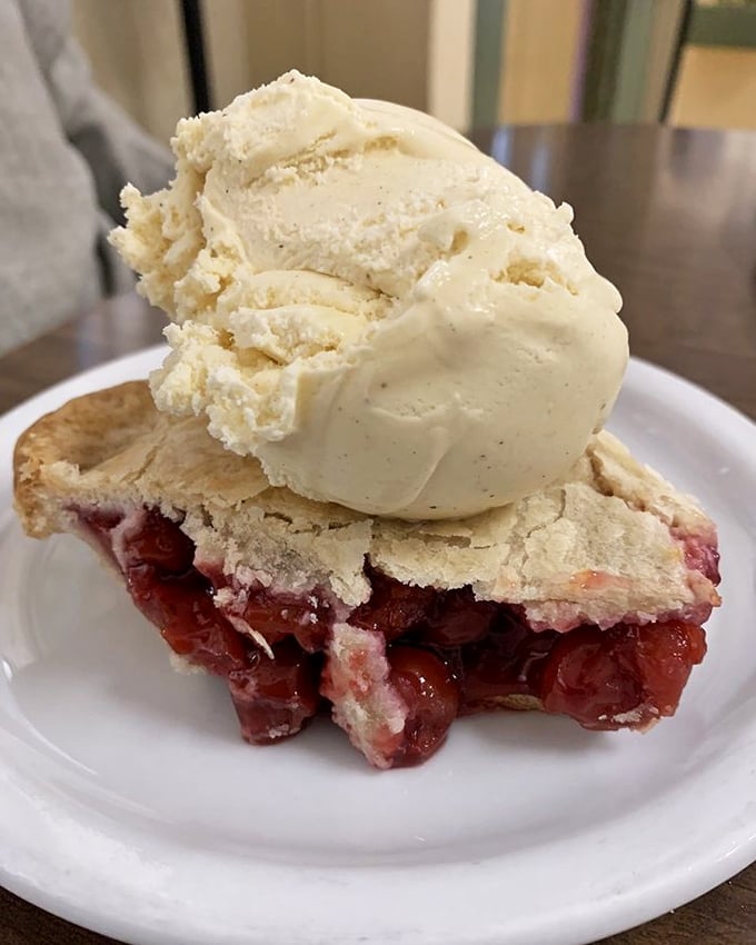 Cherry pie that makes you understand why people write songs about desserts, topped with ice cream melting just slowly enough to savor every bite.