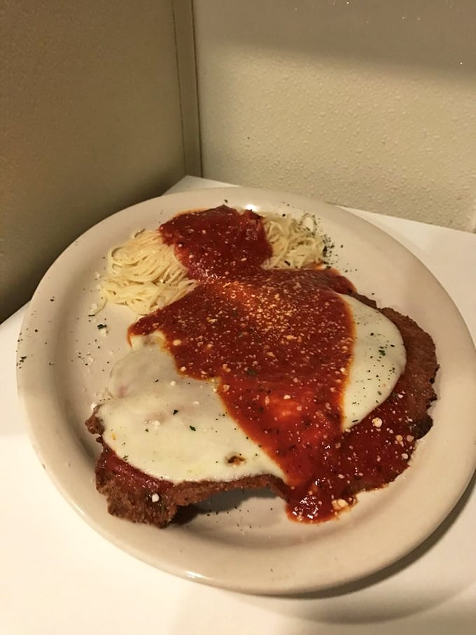 Chicken Parmesan that doesn't hide behind excess – just honest-to-goodness breaded chicken, melty cheese, and marinara that means business.