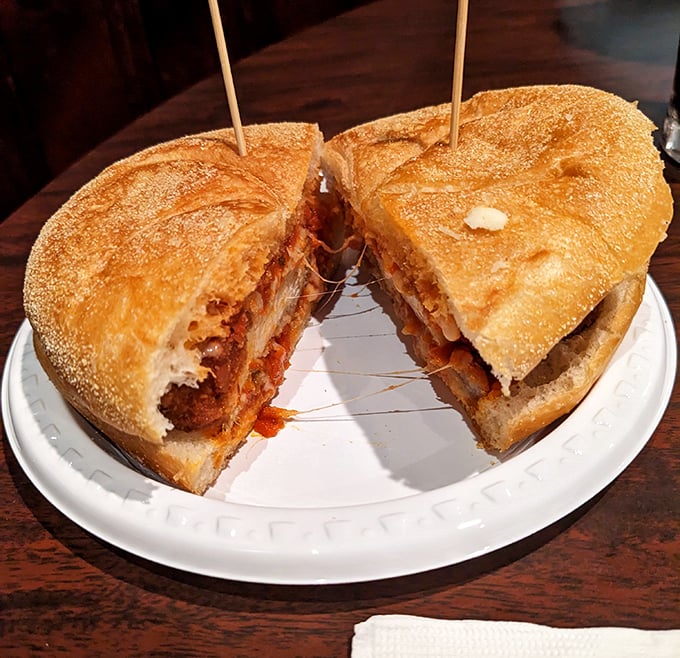 Chicken parm so generous, you'll need a strategy meeting before attempting that first bite.