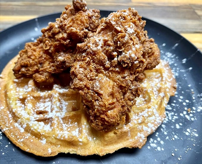 Fried chicken atop a golden waffle—a sweet and savory combination that proves breakfast and dinner should hang out more often.