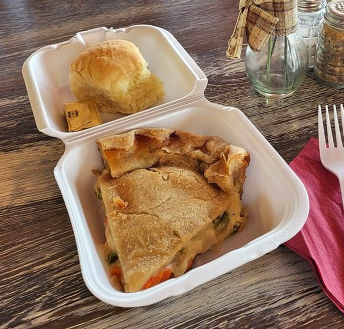 Comfort in a container – this chicken pot pie represents the savory side of A Slice of Pie's culinary expertise.