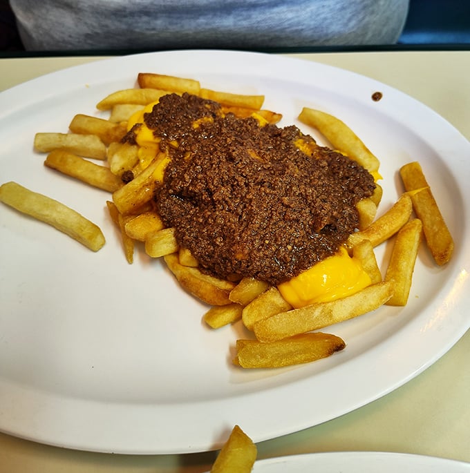 Chili cheese fries – where comfort food goes to show off. The perfect marriage of crispy potatoes and savory, meaty goodness.