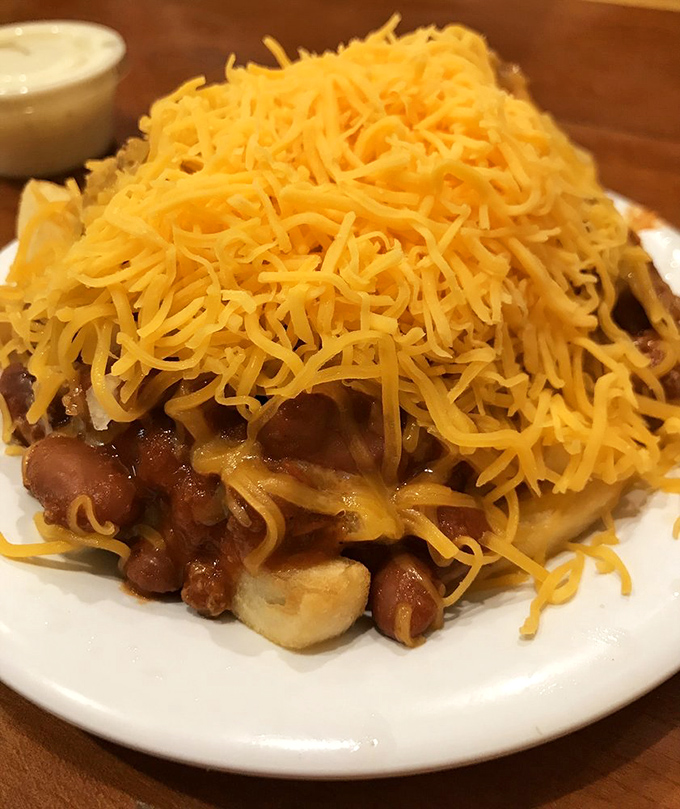 Chili cheese fries that laugh in the face of diet plans – a mountain of comfort that says "today is not the day for moderation."