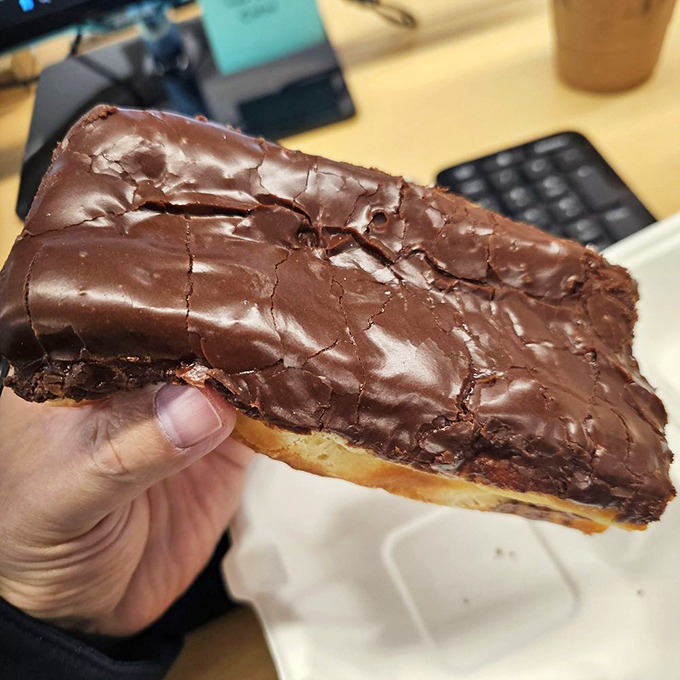 The chocolate bar donut—where excess meets necessity. When a regular chocolate donut just won't cut it, this is your nuclear option.