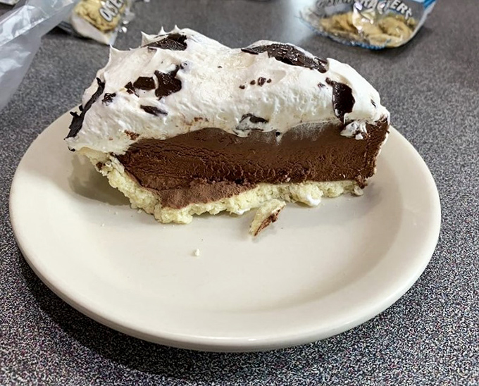 Chocolate cream pie – the sweet finale to a savory symphony. After conquering Mount Chili, reward yourself with this cloud of chocolate bliss.
