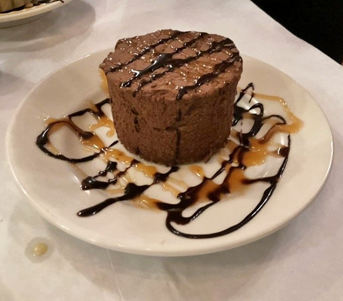 Chocolate mousse that would make a French pastry chef weep with joy. The zigzag of sauce isn't just pretty—it's a road map to happiness.