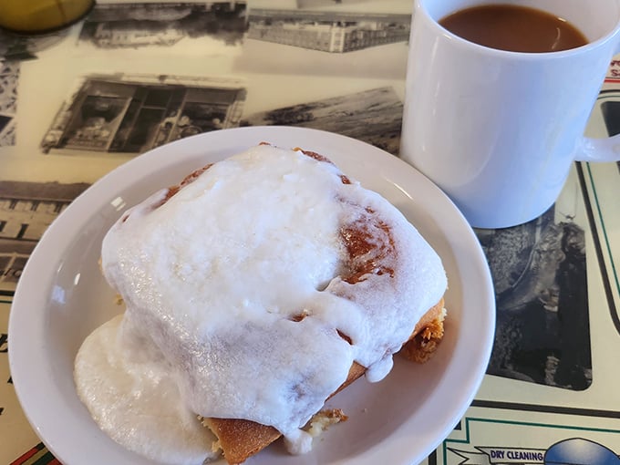 That cinnamon roll isn't just breakfast – it's dessert masquerading as a morning meal, and we're completely fine with that delicious deception.