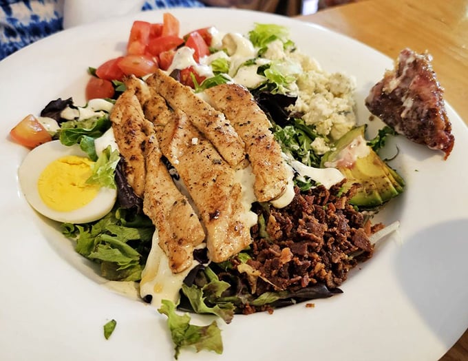 A Cobb salad that doesn't just sit there looking pretty—it demands your attention with perfectly grilled chicken, crispy bacon, and that egg bringing it all together.