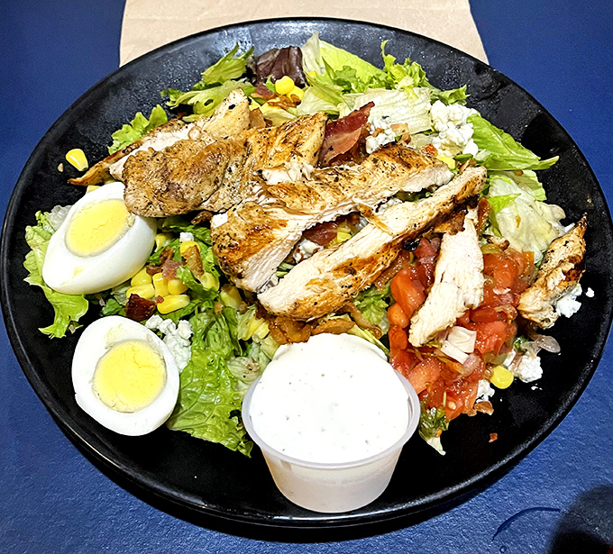 A Cobb salad that actually makes you excited about eating greens—protein-packed and arranged with the precision of a Renaissance painting.