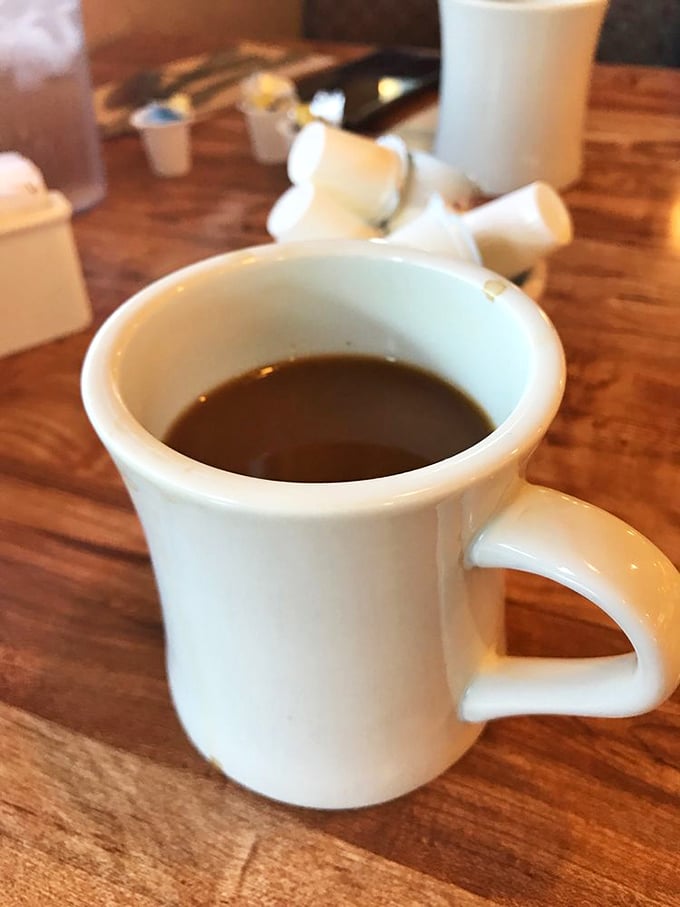 A simple white mug of coffee – the unsung hero of every great breakfast. No foam art needed when the brew speaks for itself.