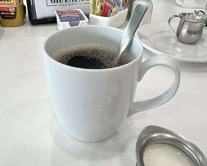 Coffee served hot, strong, and honest—the kind that doesn't need fancy names or elaborate preparation to start your day right.