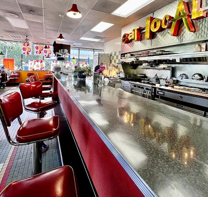 The gleaming counter invites you to pull up a stool and watch breakfast artistry in action – better than any cooking show on television.