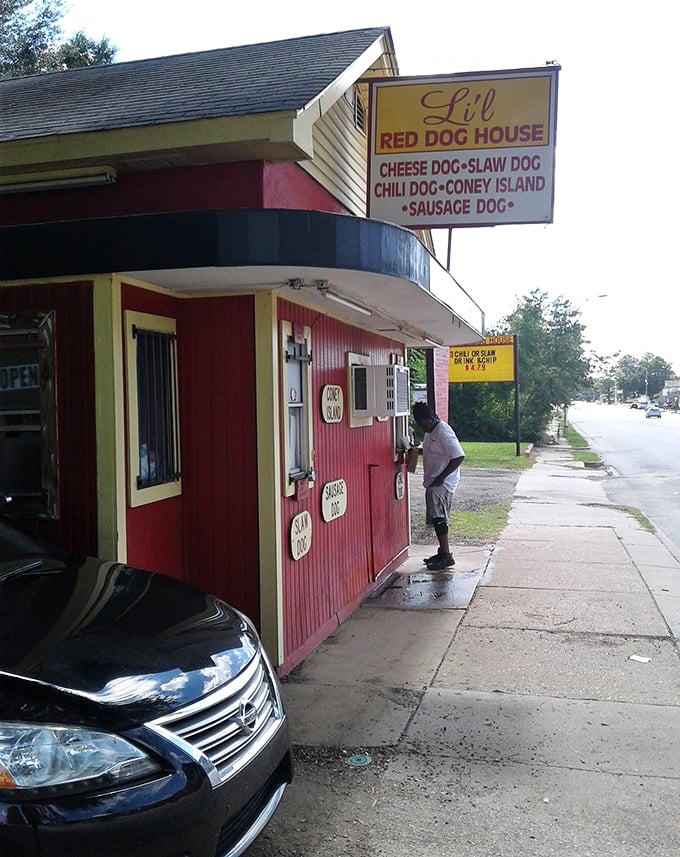 The drive-up window experience: where hot dog transactions happen with the efficiency of Wall Street but the soul of Main Street.