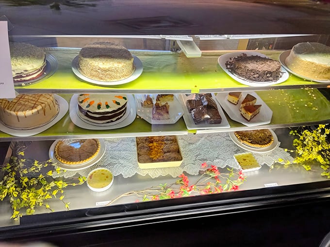 The dessert case: where willpower goes to die and "I'll just have a bite" becomes the lie we tell ourselves.
