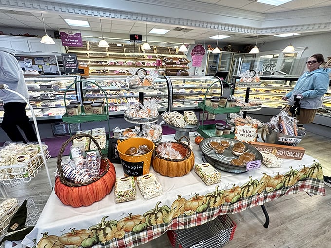 Seasonal displays that prove pumpkins aren't just for carving - they're for decorating your bakery too.