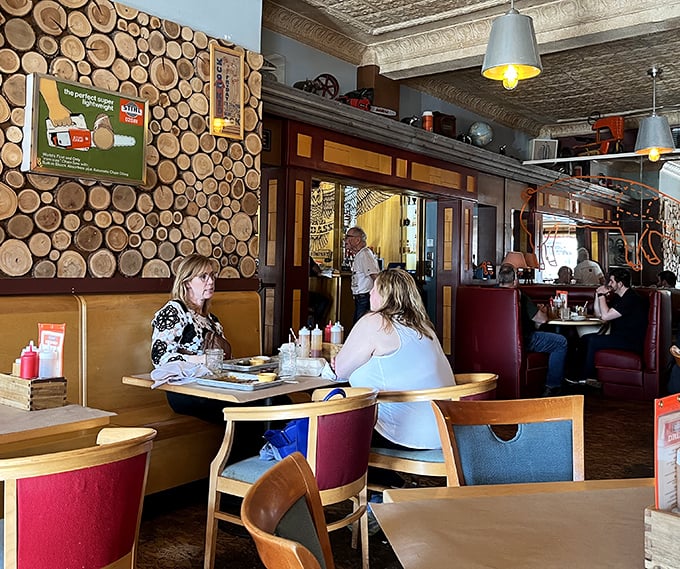 The wood-paneled walls and vintage décor create the perfect backdrop for what truly matters: friends, family, and food worth lingering over.