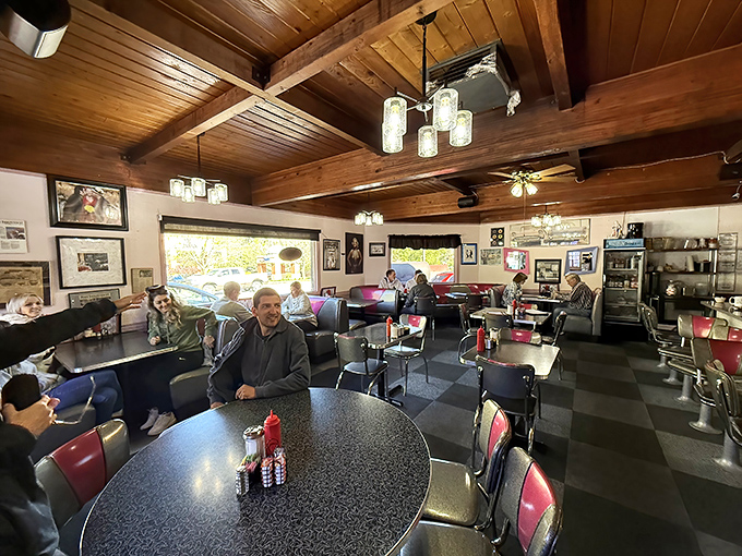 The dining room buzzes with the energy of satisfied customers. Notice nobody's looking at their phones—the food demands full attention.