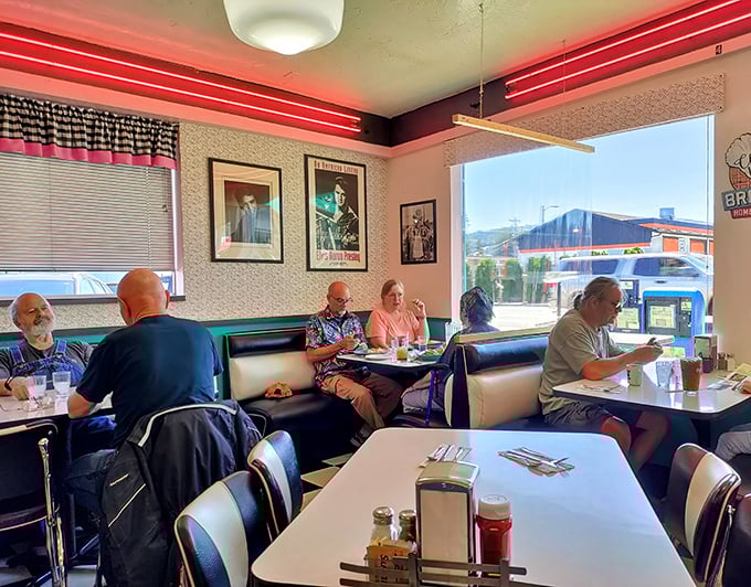 Those red vinyl booths aren't just seating—they're front-row tickets to the greatest show on earth: people enjoying honest-to-goodness comfort food.