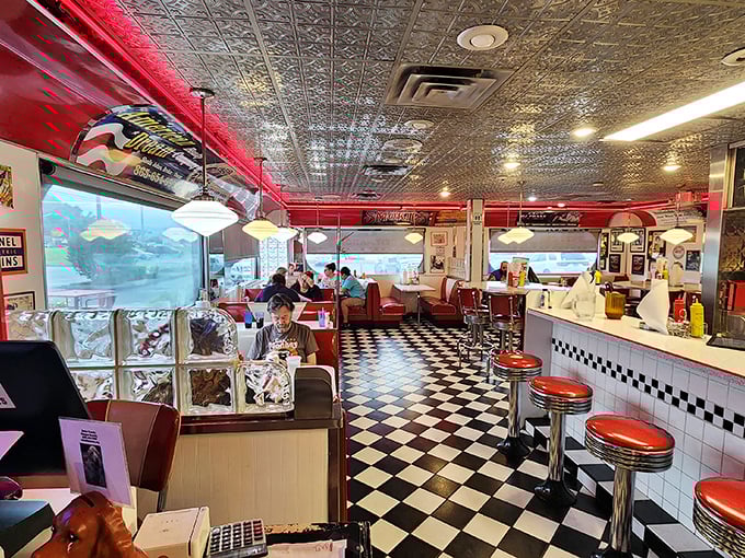 Where memories are made between bites. The pressed tin ceiling and vintage décor aren't manufactured nostalgia—they're the real McCoy.
