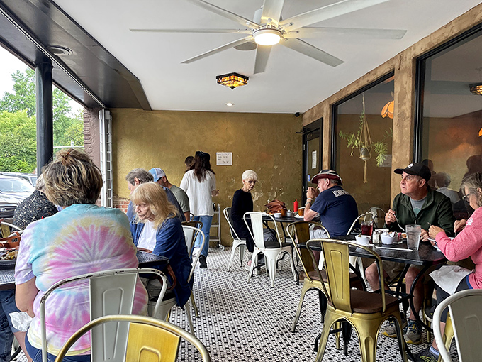 The outdoor seating area buzzes with the energy of people who've discovered something special – the universal language of good food bringing strangers together.