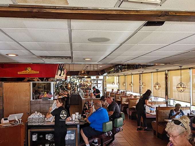 Where locals gather to solve the world's problems over plates of eggs and endless coffee refills – democracy in action.