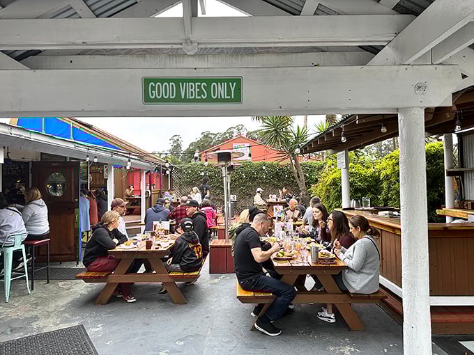 "Good Vibes Only" isn't just a sign—it's the unspoken rule at this outdoor gathering spot where strangers become friends over shared maple syrup.