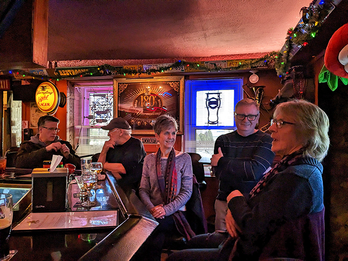 The bar area—where strangers become friends and friends become family. All united by the universal language of good barbecue.