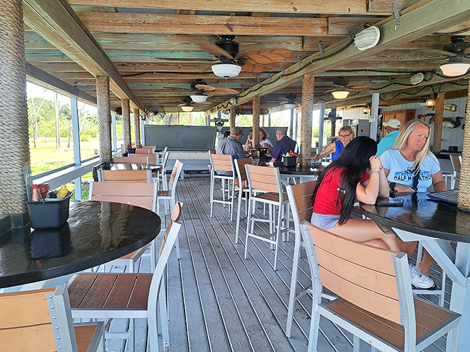 Where strangers become friends over shared tables and seafood recommendations. Notice how nobody's looking at their phones—the food demands full attention.