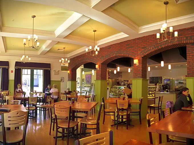 The dining room's warm wood and brick create that perfect "third place"—not home, not work, but somewhere you belong nonetheless.