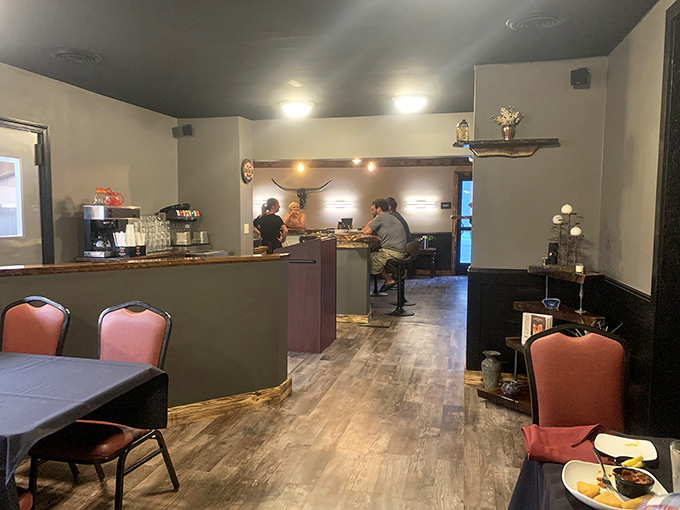 Where conversations flow as smoothly as the service in a dining room designed for both comfort and connection.