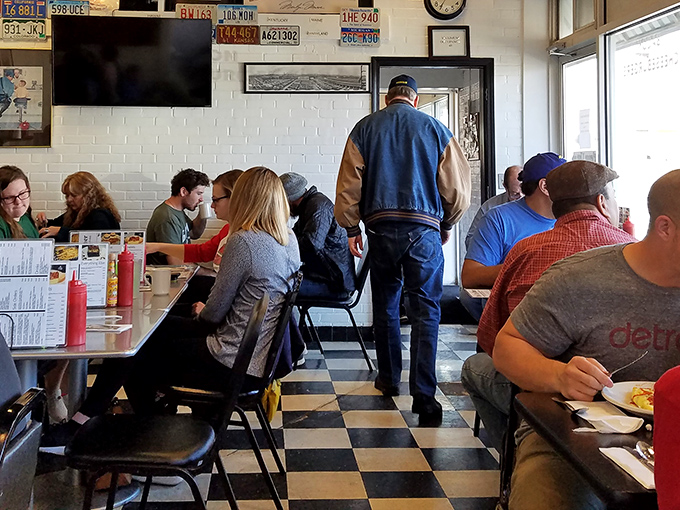 The true measure of any great diner—a diverse crowd of regulars and newcomers, all united by the universal language of good food.