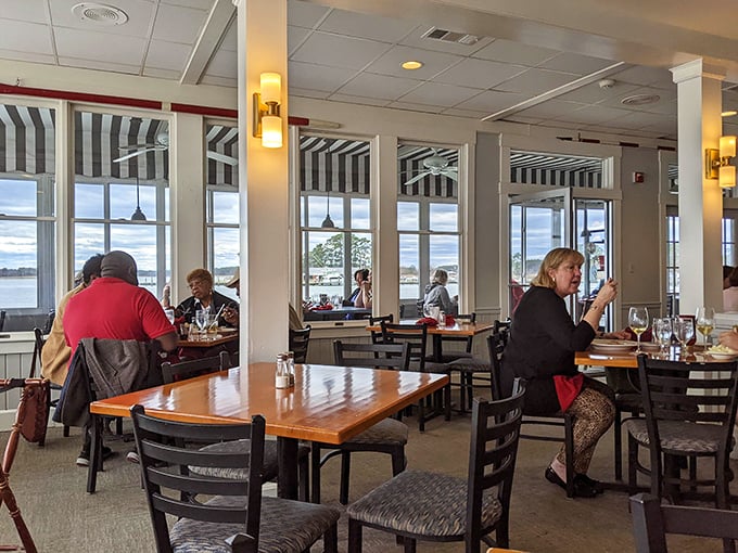 Where locals and visitors unite in the universal language of "mmm." The striped awnings frame water views better than any museum could.
