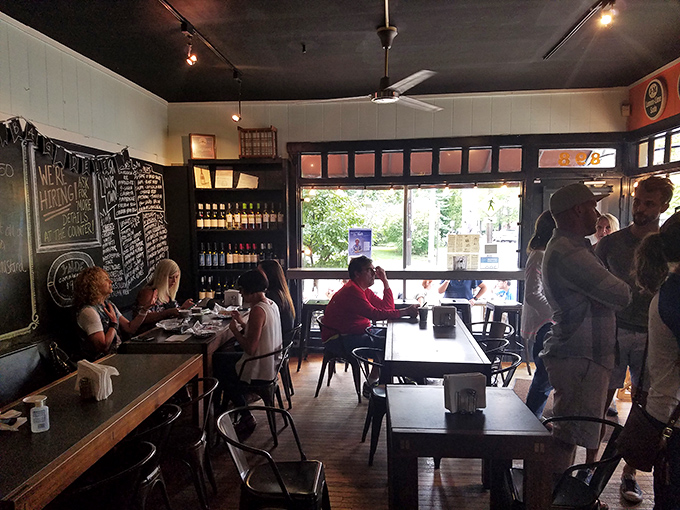Lunchtime at Brown Bag isn't just eating—it's a communal ritual where strangers share tables and the unspoken understanding that they've made an excellent life choice today.