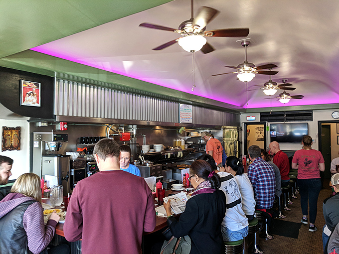 A busy morning at Stav's—where regulars and first-timers share counter space and the universal language of "pass the syrup, please."
