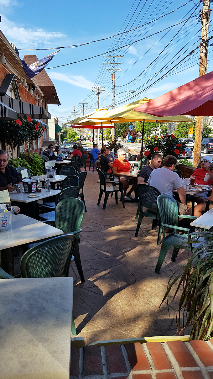 The patio buzzes with conversation and laughter – proof that good food brings people together better than any social media app.