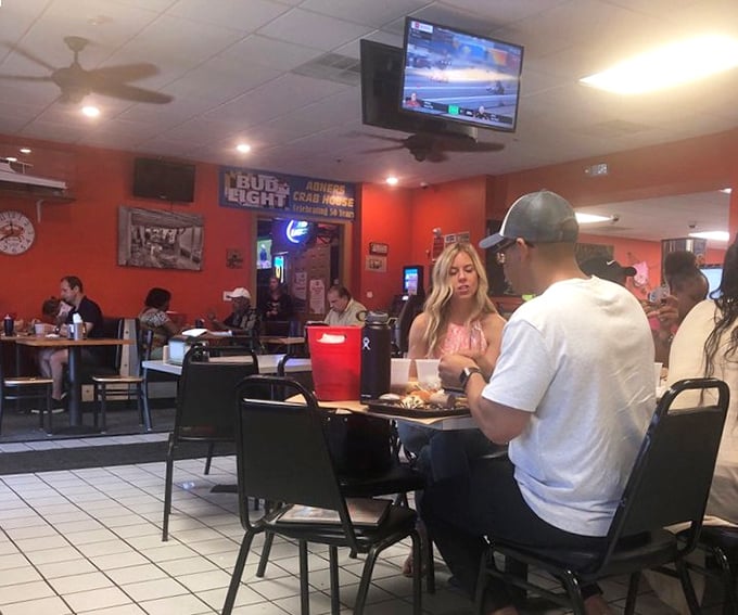 Real seafood joints aren't about the ambiance—they're about people hunched over tables, sleeves rolled up, fully committed to the serious business of enjoyment.