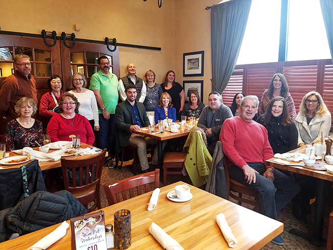 A gathering of happy diners proving that Stancato's isn't just a restaurant—it's where community happens, one forkful of pasta at a time.