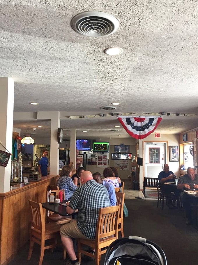 The dining room hums with conversation and laughter—the soundtrack of a beloved local establishment where everyone feels at home.