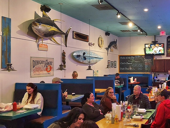 Blue booths filled with happy diners and mounted fish watching over them—the circle of food life at Big Billy's.