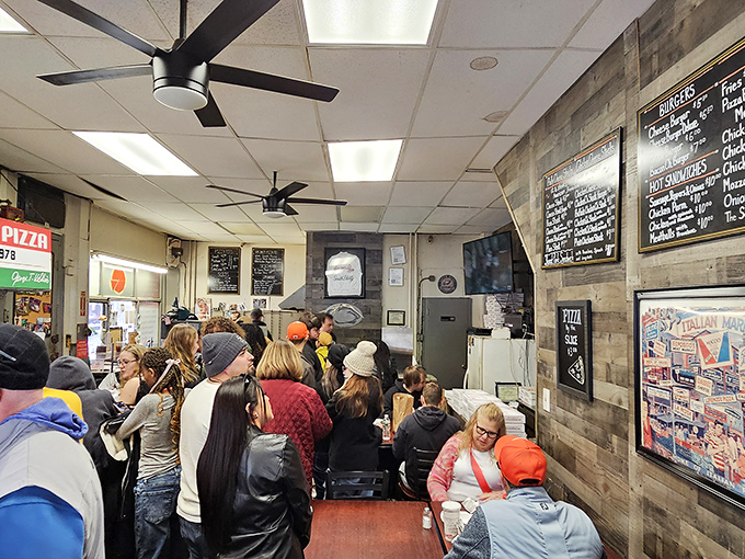 The crowd doesn't lie—when locals are willing to wait in line for pizza in a city full of options, you know you've found something special. 