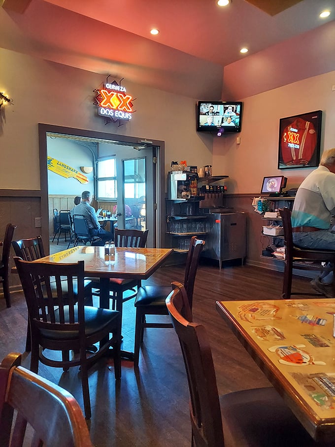 Even the side room maintains that welcoming vibe where conversations flow as easily as the drinks from the nearby bar.