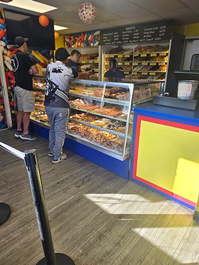 The ordering counter—where dreams come true and diets go to die. Worth every minute in line, every calorie consumed.