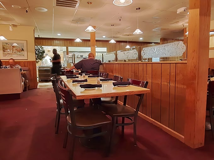 The dining room—where strangers become friends over shared appreciation of perfectly cooked beef. Notice the absence of phones? That's intentional.