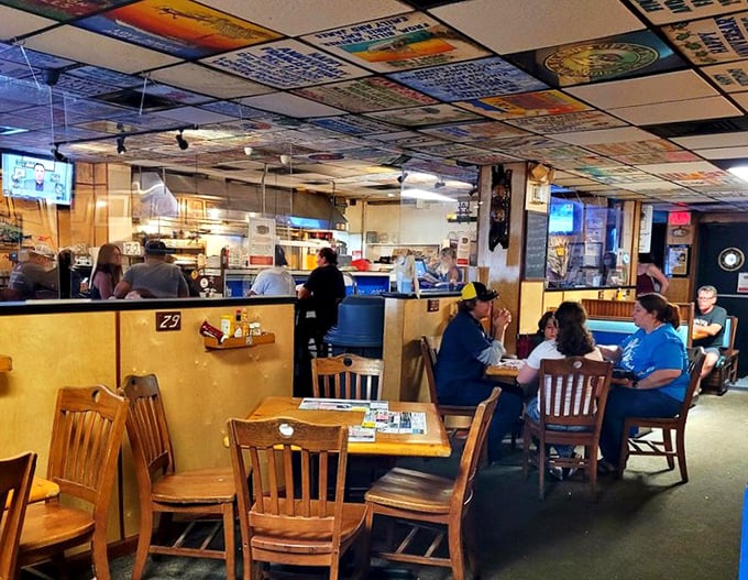 The dining room hums with the universal language of seafood satisfaction—forks diving, heads nodding, conversations flowing.