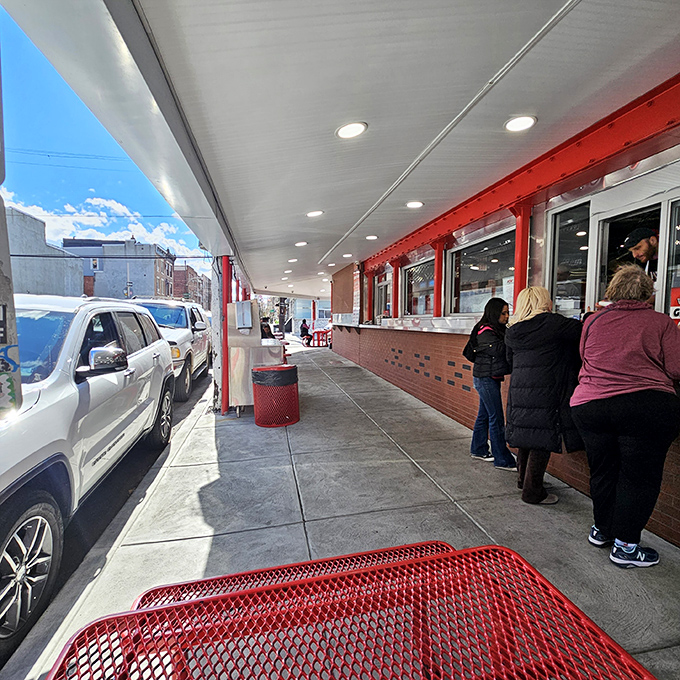The pilgrimage in progress. These aren't just customers—they're participants in a ritual that's defined Philadelphia for generations.