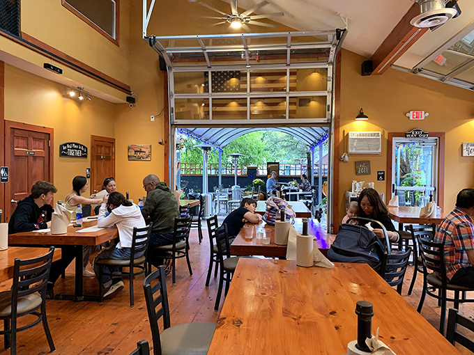 The garage door that opens to outdoor seating isn't just clever design—it's an invitation to enjoy your barbecue feast in whatever environment suits your mood.