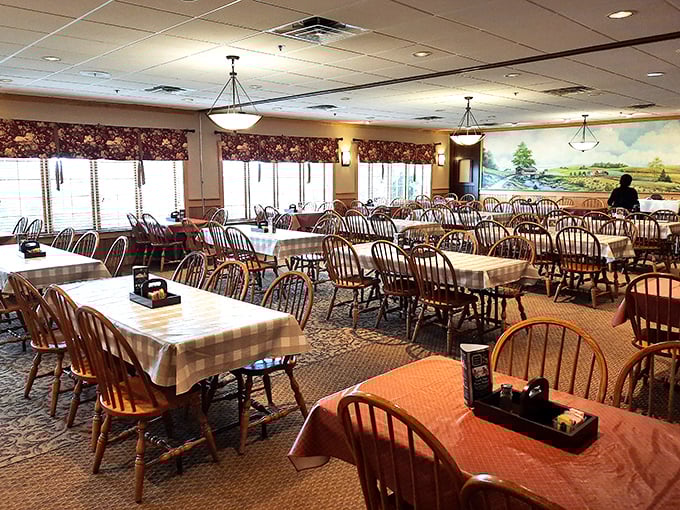 The dining room stretches out like a promise—each table an opportunity for memories made over mashed potatoes and gravy boats.