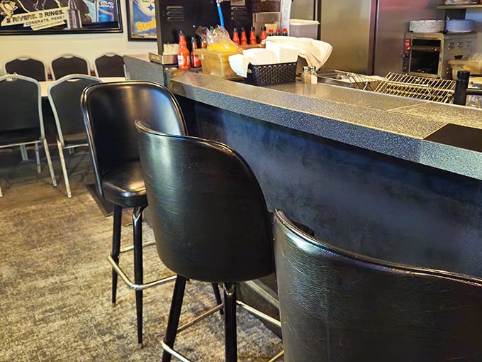 These aren't just bar stools – they're front-row seats to Pittsburgh's most authentic culinary theater, where every meal tells a story.
